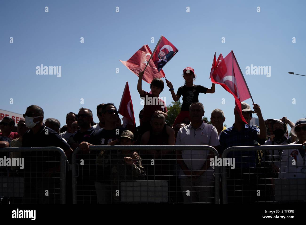 People are seen waiting in front of the mausoleum during Victory Day ...