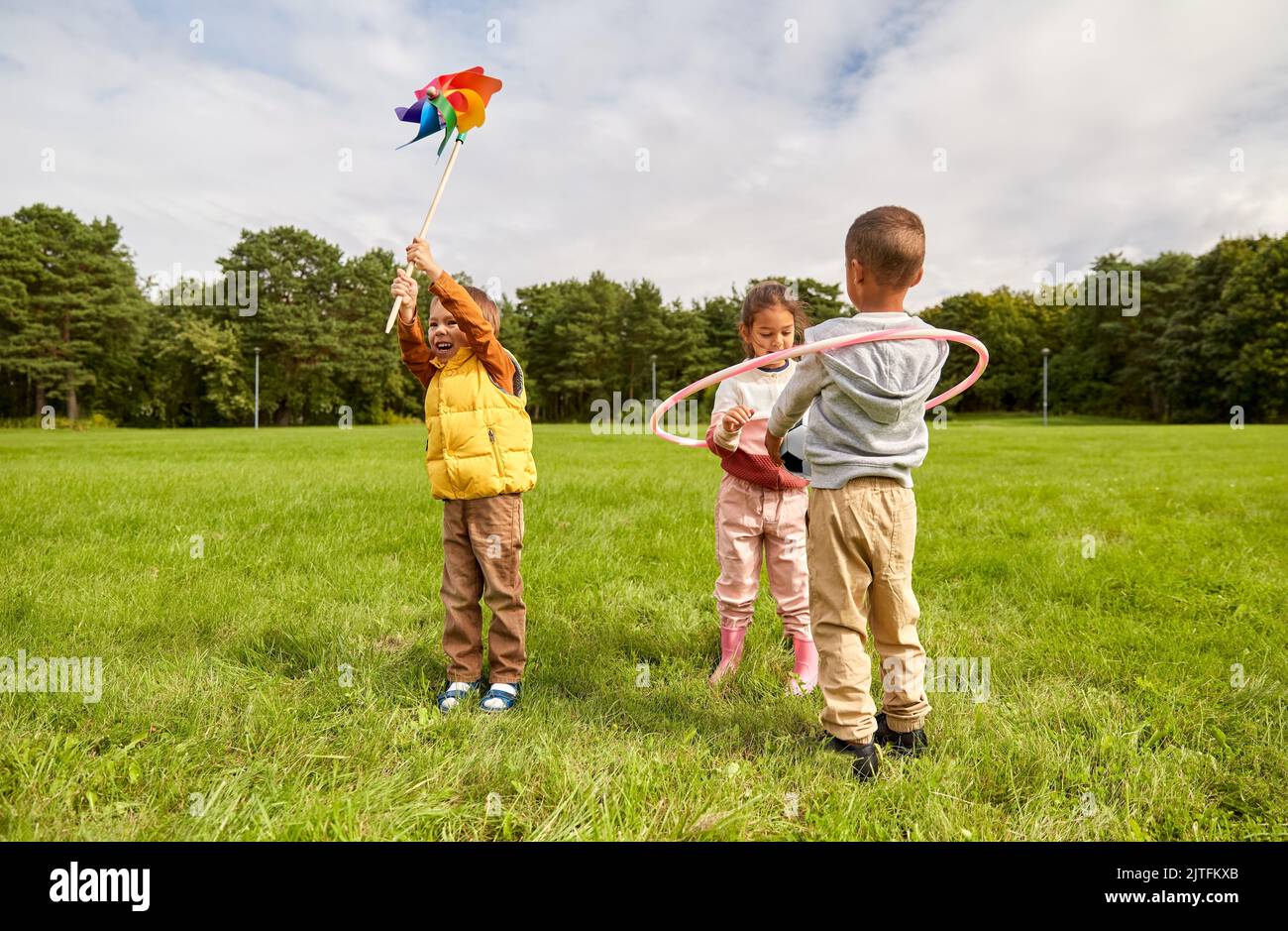 Happy kid hula hoop african american hi-res stock photography and ...