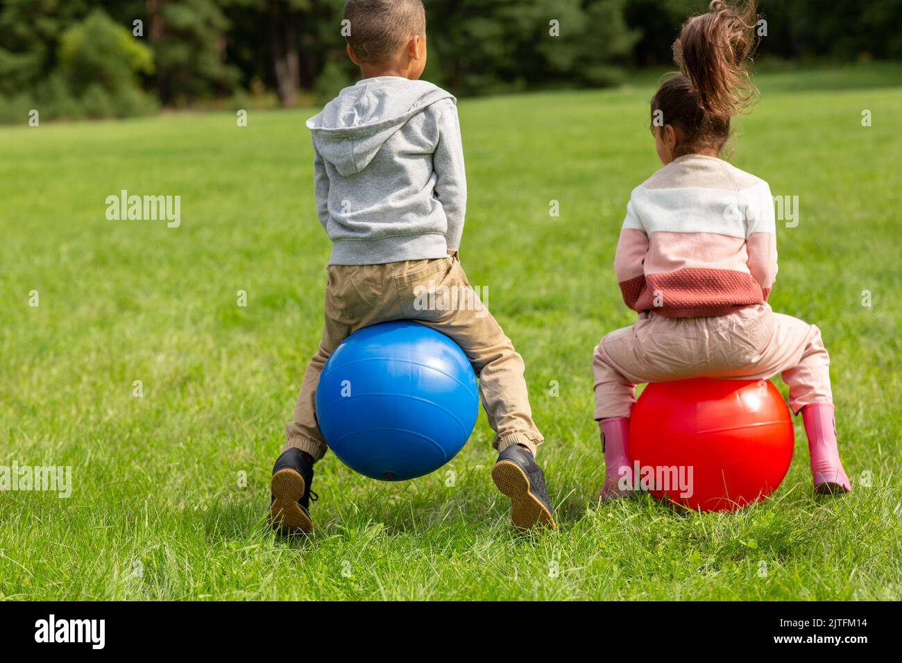 African girl jumping ball hi-res stock photography and images - Alamy