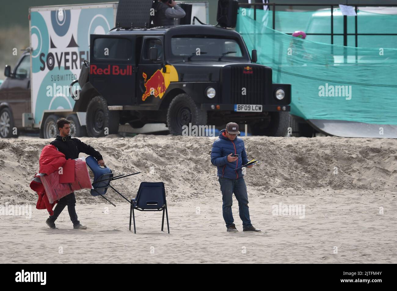Red Bull 4x4 vehicle at surfing competition with judge Cornwall Stock ...
