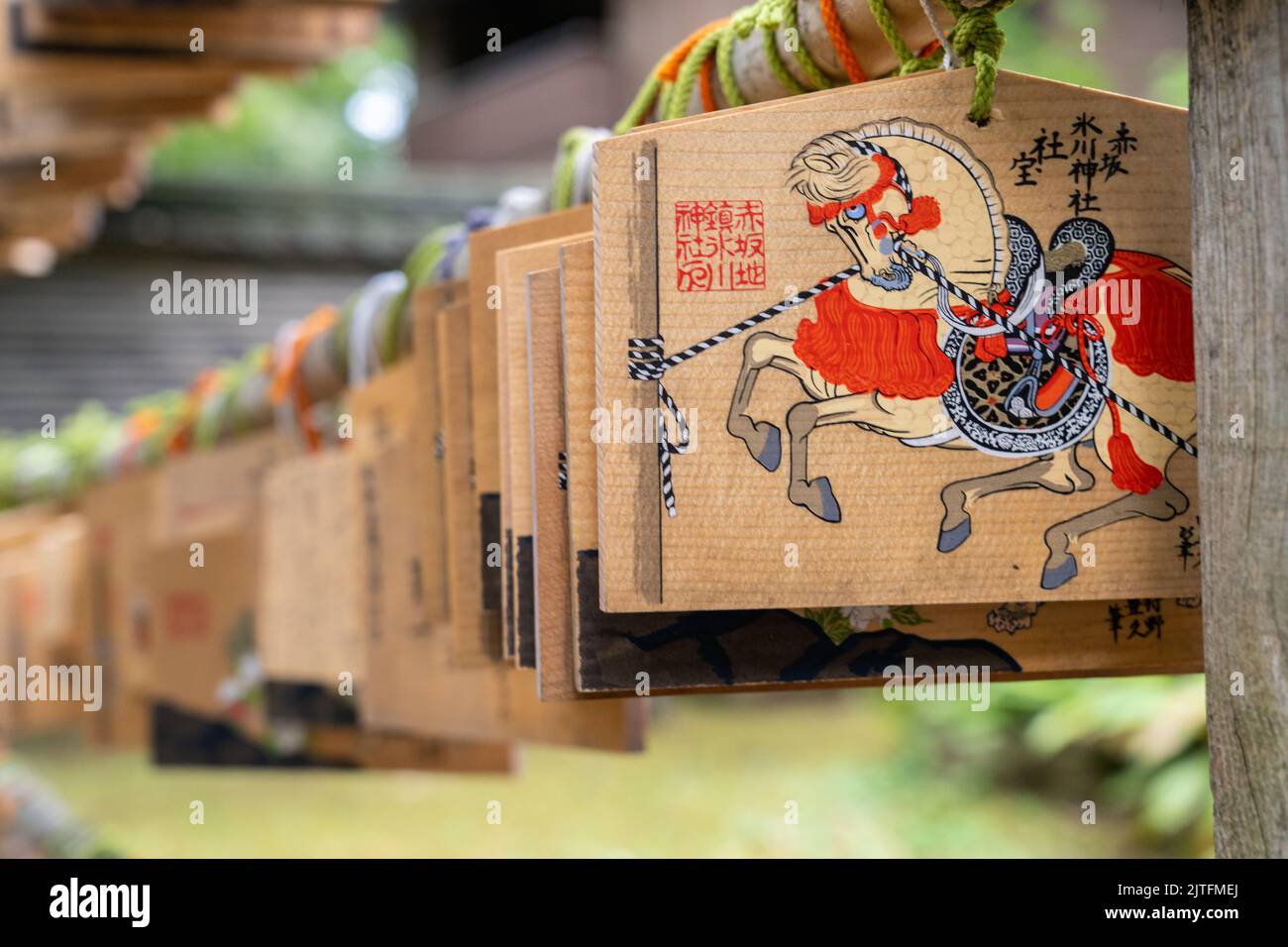 Ema prayer plaques left by worshippers at the Akasaka Hikawa Shrine, in ...