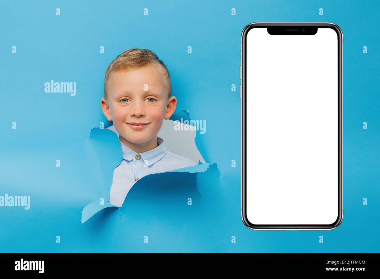Happy Cute Boy Is Having Fun Played On Blue Background Wall Climbs 0828