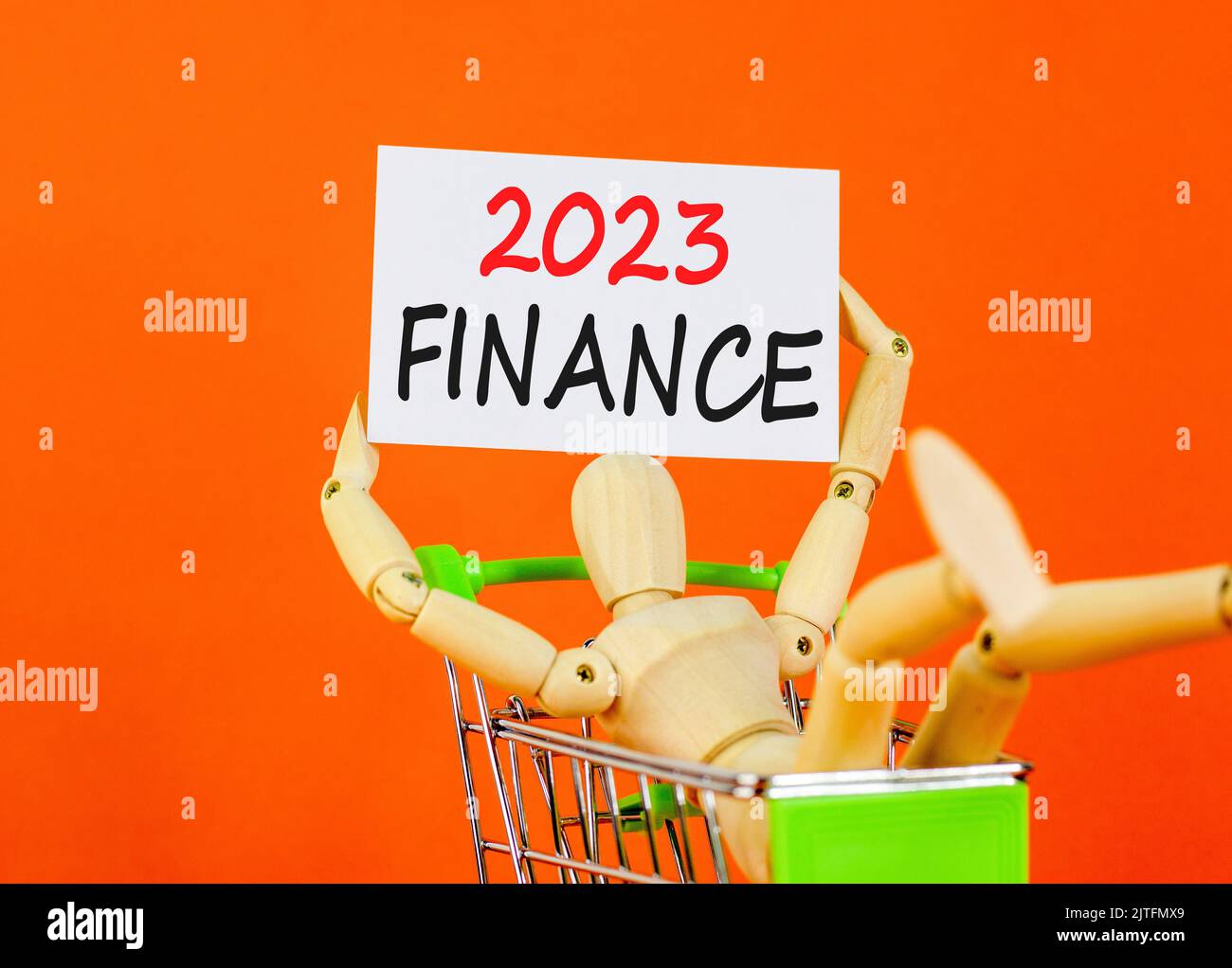 2023 Finance symbol. White paper with words 2023 Finance, human model ...