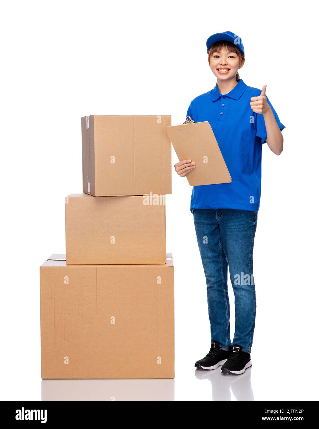 delivery woman in blue uniform with parcel boxes Stock Photo - Alamy