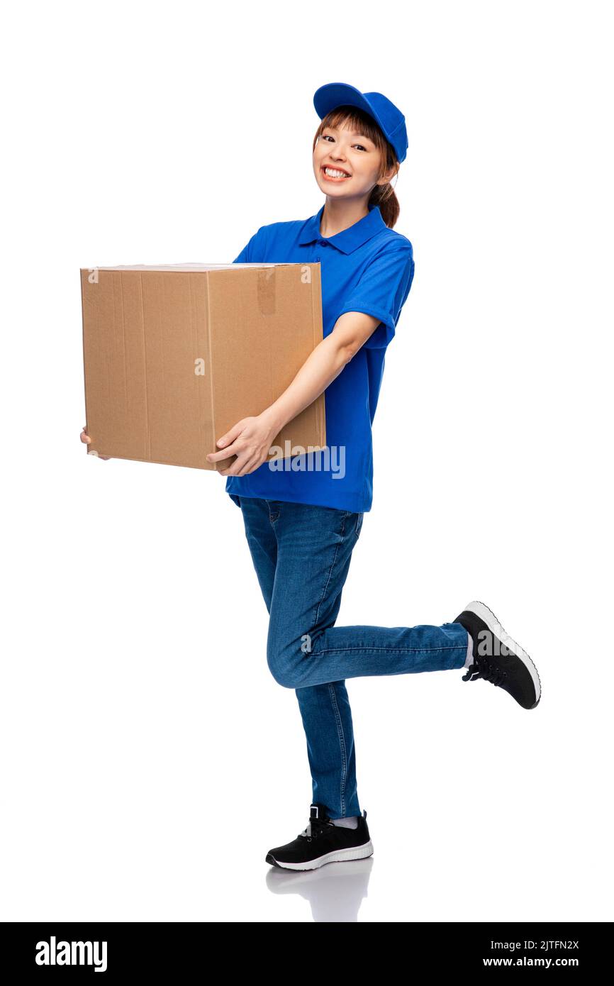delivery woman in blue uniform with parcel box Stock Photo - Alamy