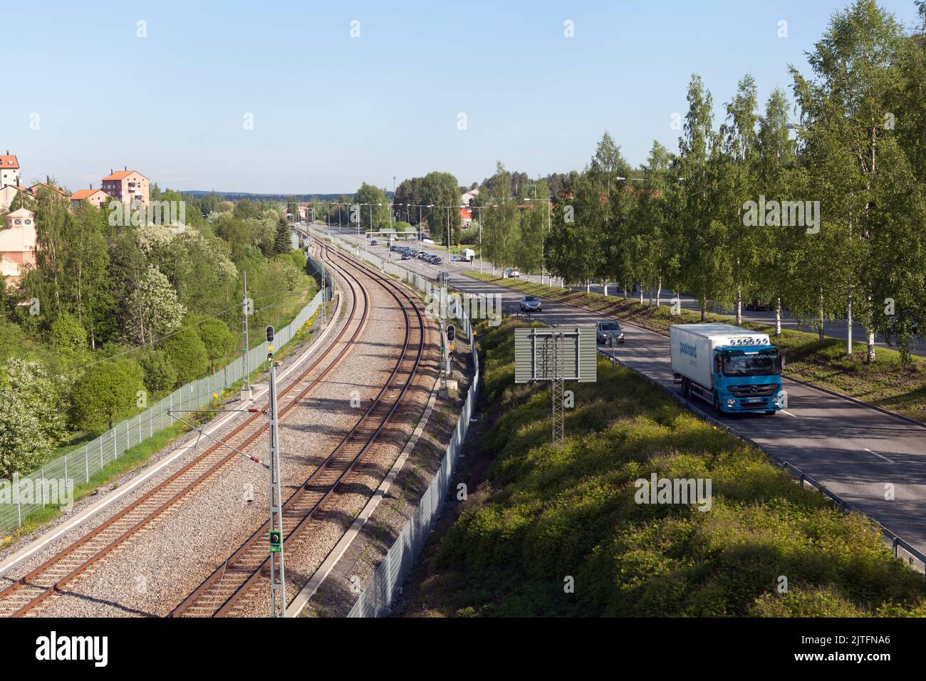 UMEA, SWEDEN ON JUNE 02, 2016. View of railroad tracks and a highway ...