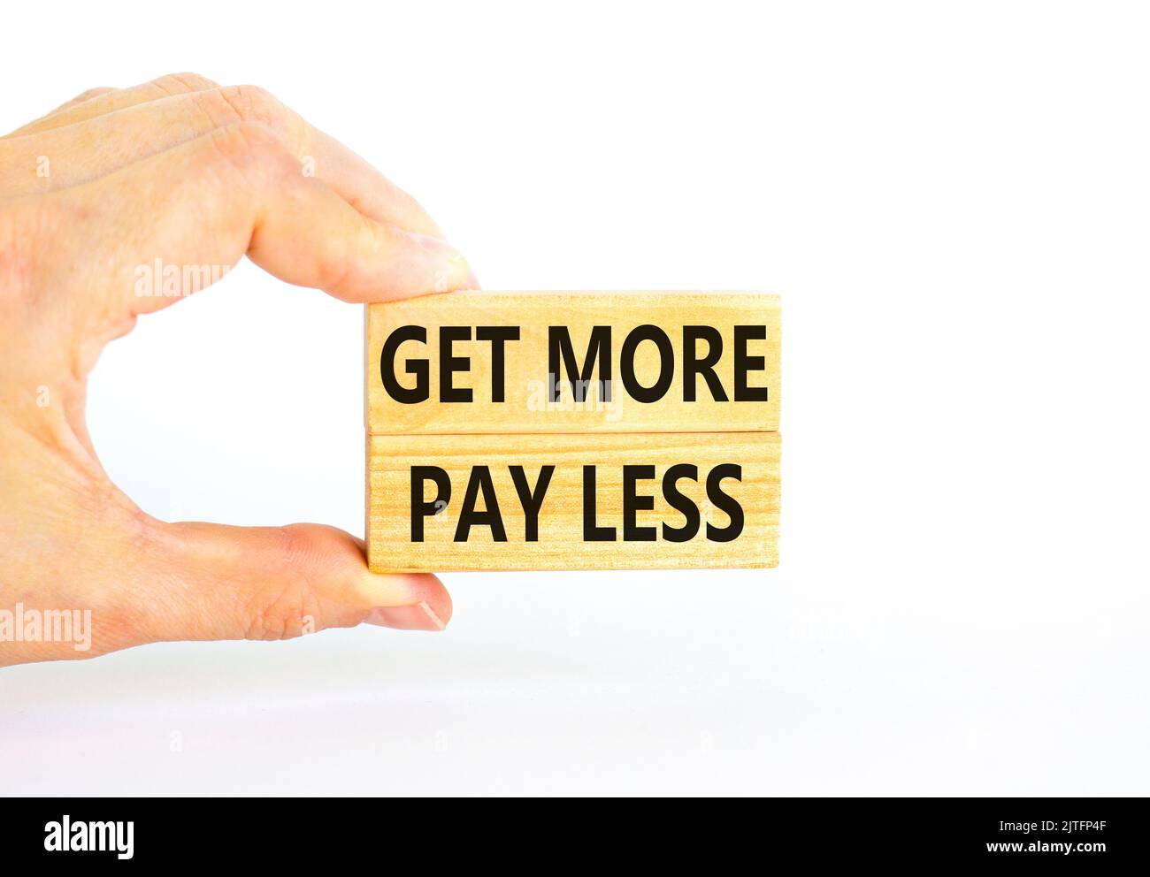 Get more pay less symbol. Concept words Get more pay less on wooden ...