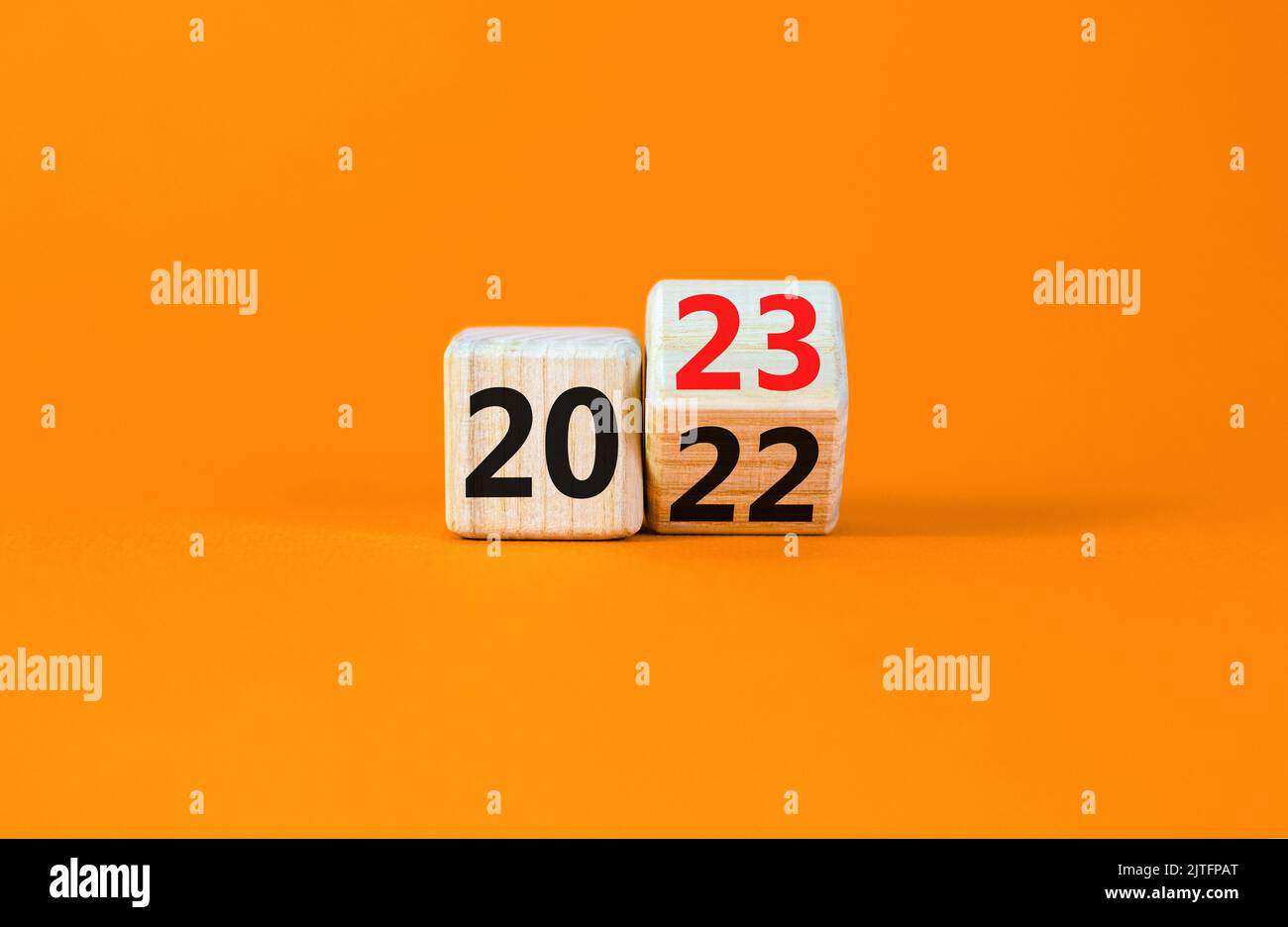 2023 happy new year symbol. Wooden cubes symbolize the change from 2022 ...