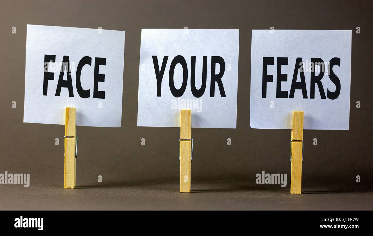 Face your fears and support symbol. Concept words Face your fears on ...