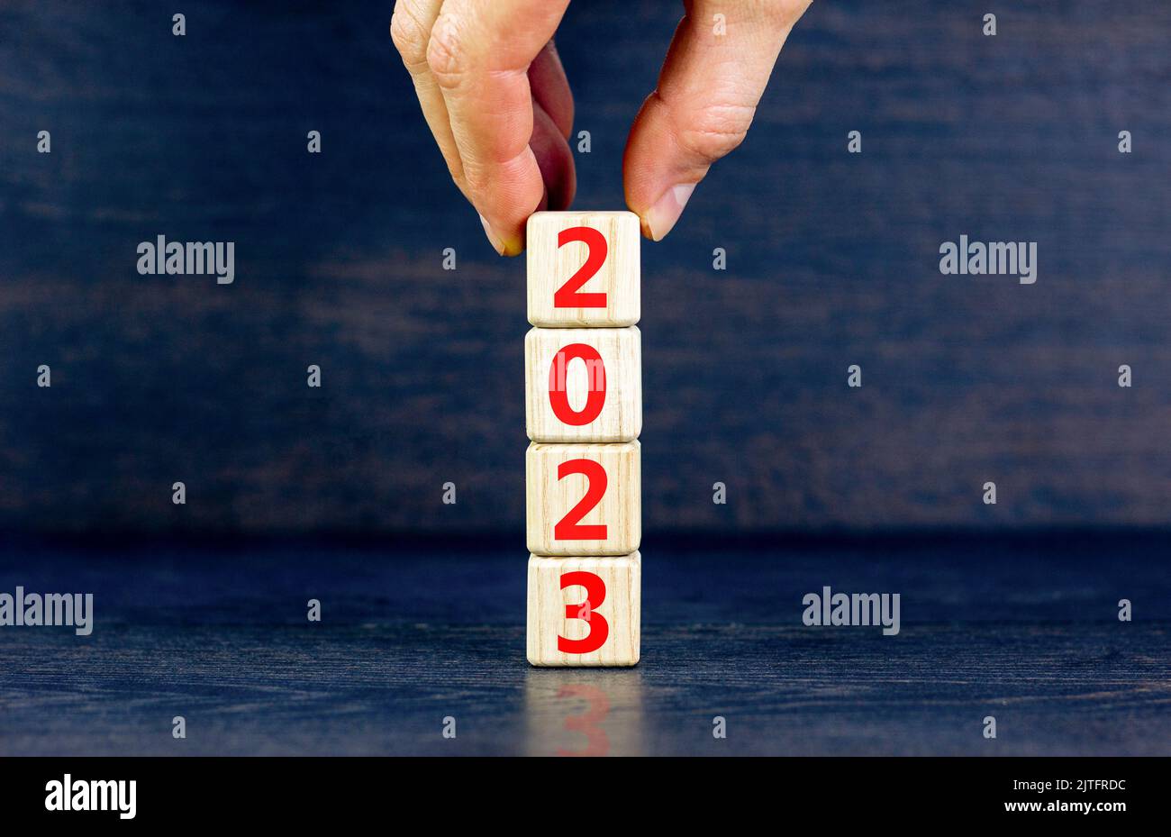 2023 happy new year symbol. Wooden cubes symbolize the change from 2022 ...