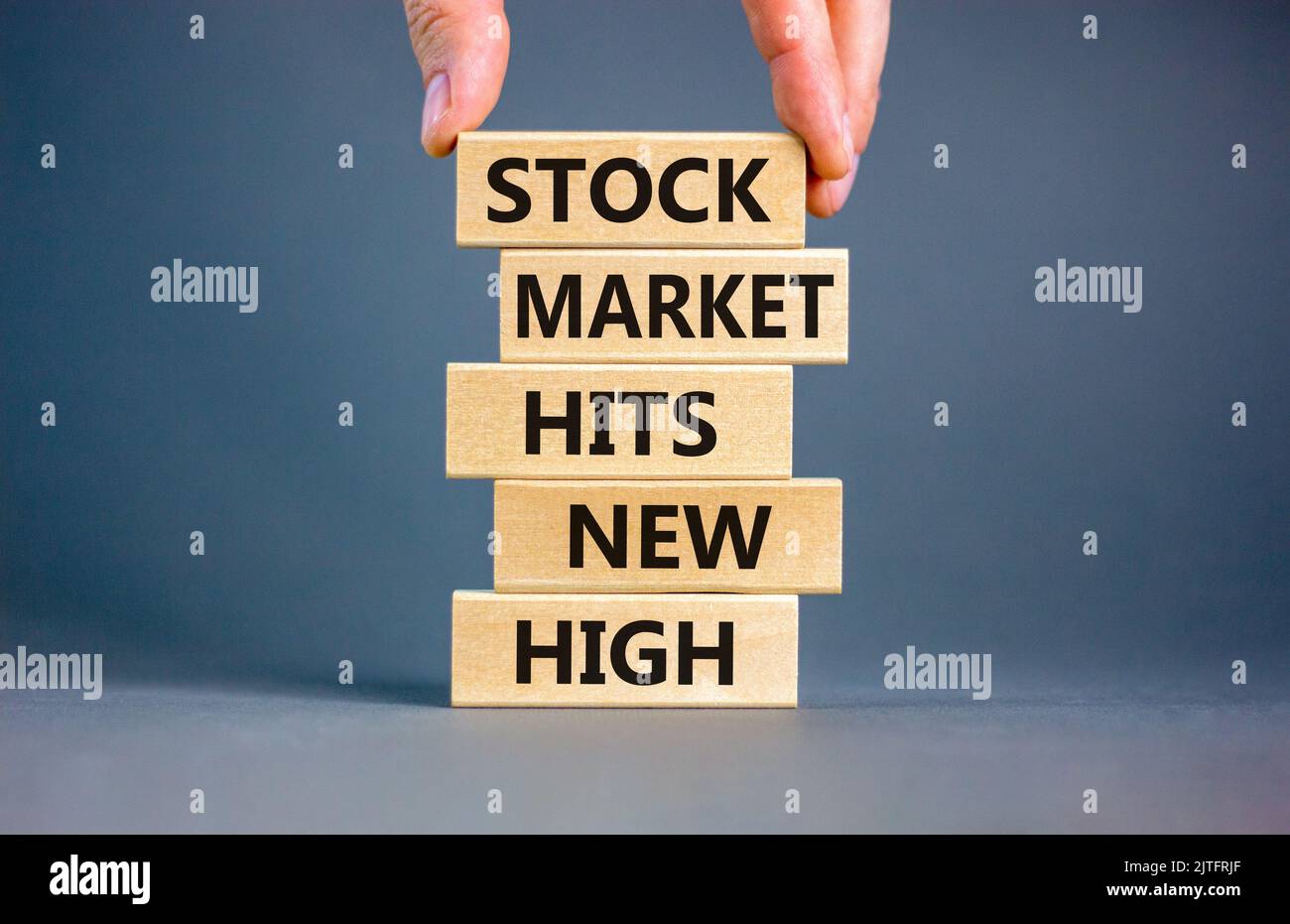 Stock market hits new high symbol. Concept words Stock market hits new ...