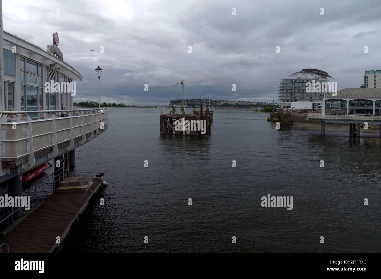 Cardiff Bay 2022 with restaurants, hotel and wooden mooring structure ...