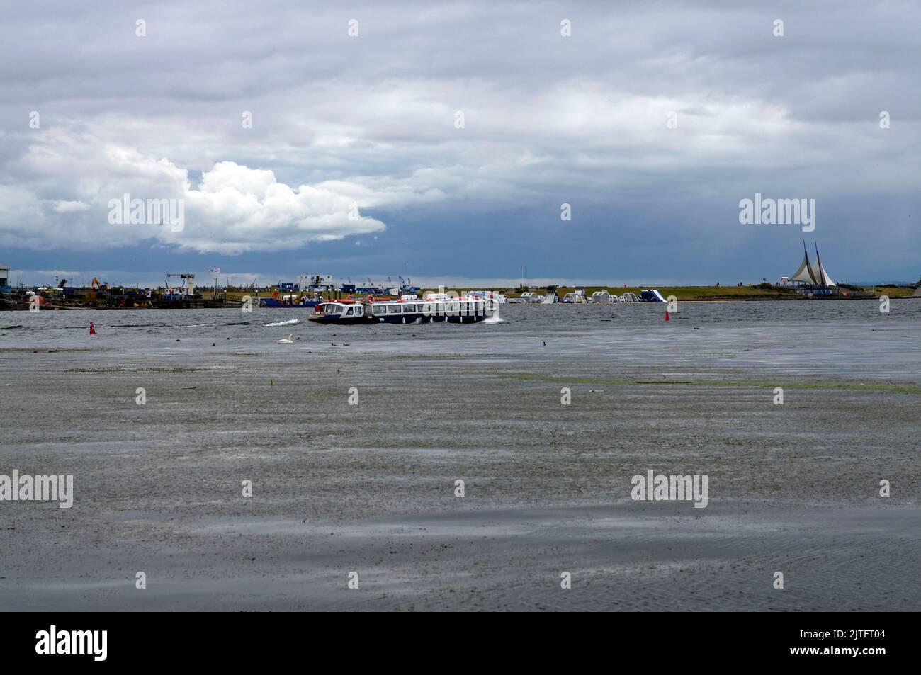 Cardiff Bay - Bay cruise boat and strange cloud formation over the ...