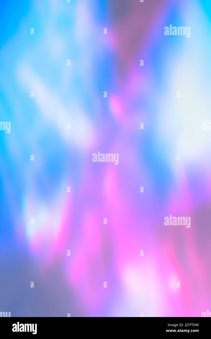 shadow and light caustic effect on holographic pink wall Stock Photo ...