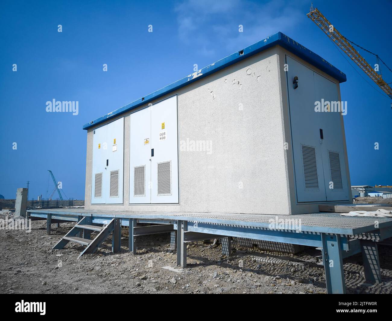 Electric transformer substation at construction site Stock Photo - Alamy