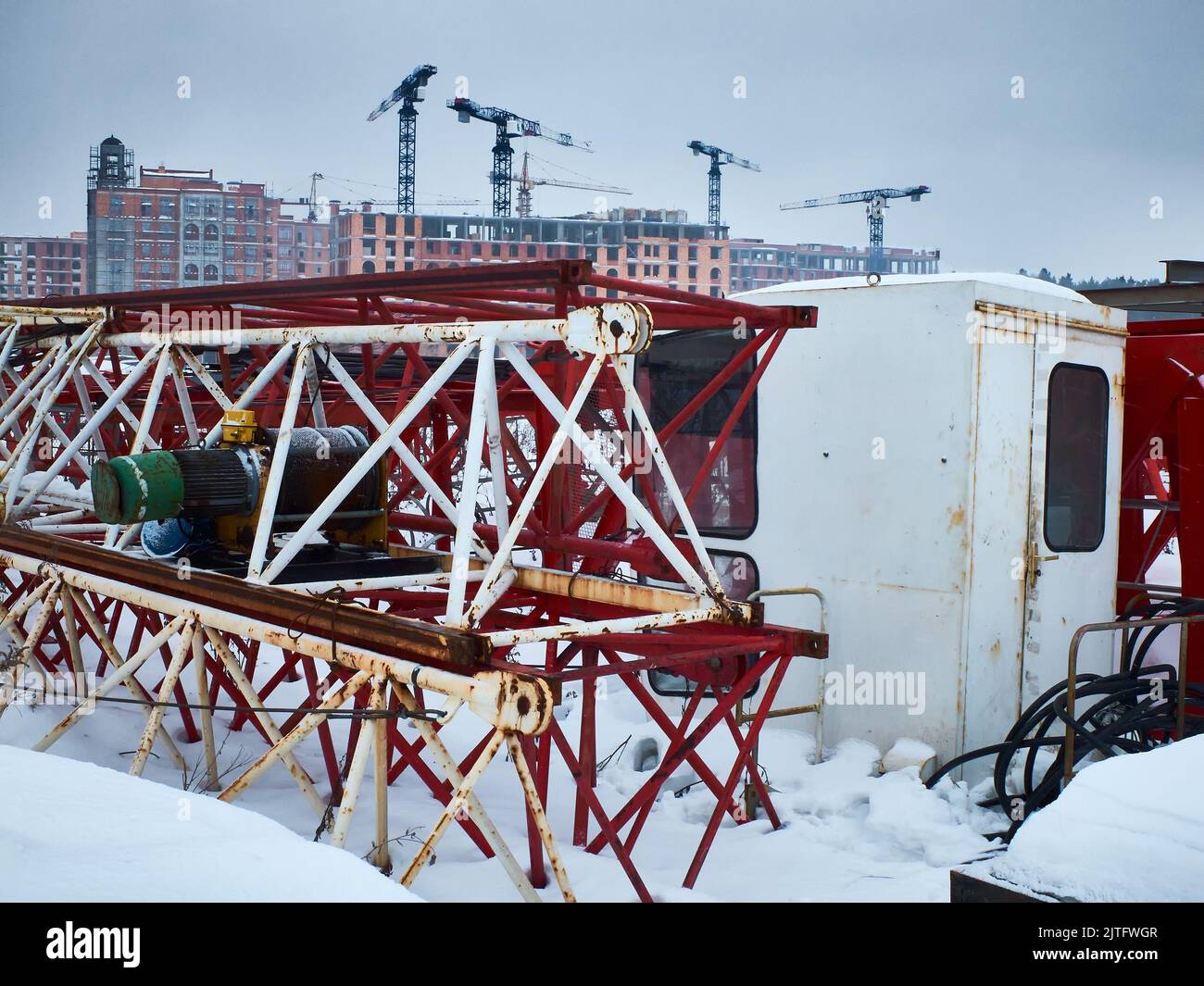 Dismantled tower crane covered with snow Stock Photo - Alamy