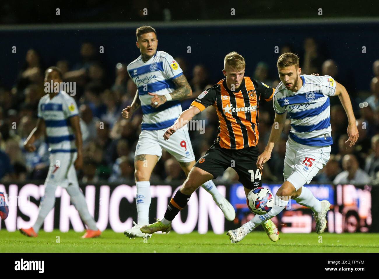 Andy Cannon #14 of Hull City closes down Sam Field #15 of QPR Stock ...
