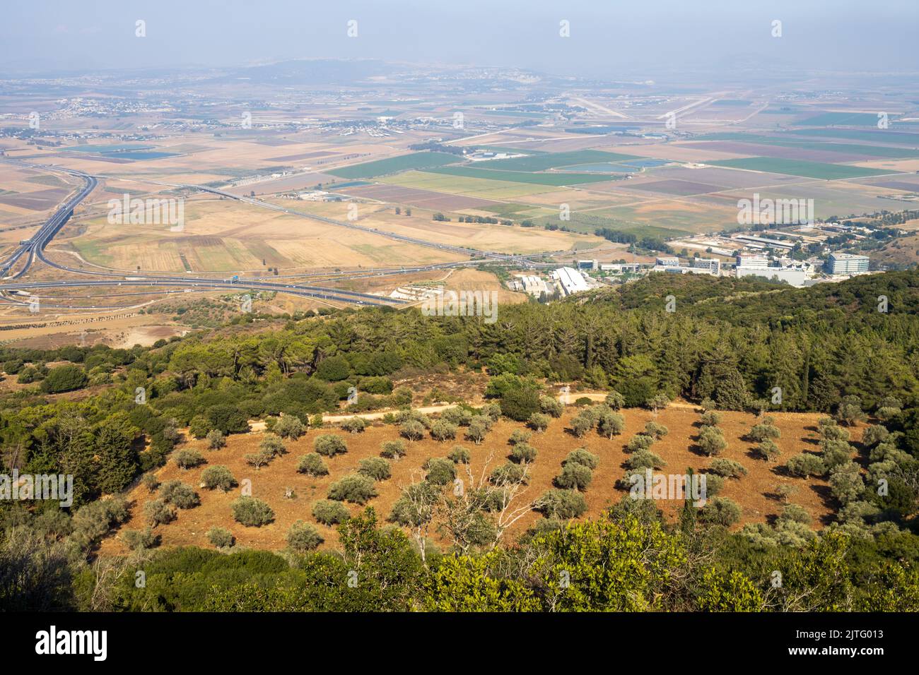 View of the Jezreel Valley in fog in winter cloudy day from Muhraqa on ...