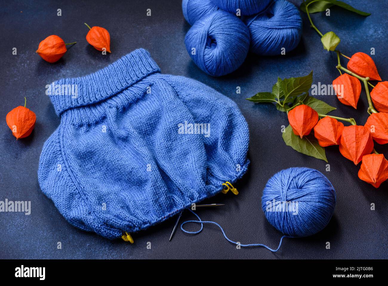 Children's blouse tied with their own hands from blue woolen threads ...