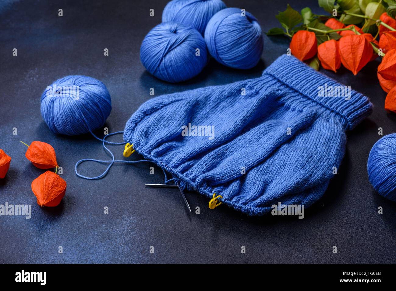 Children's blouse tied with their own hands from blue woolen threads ...