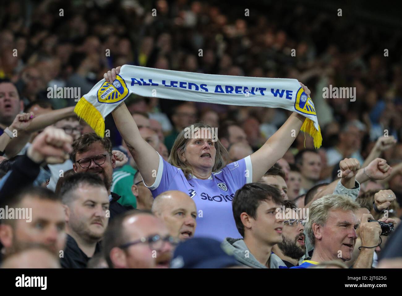 A Leeds fan waves a scarf during the Premier League match Leeds United ...