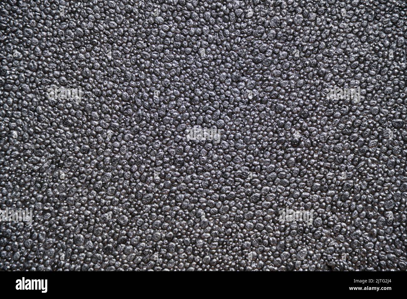 Abstract background, grey foam texture, porous material made up cells ...