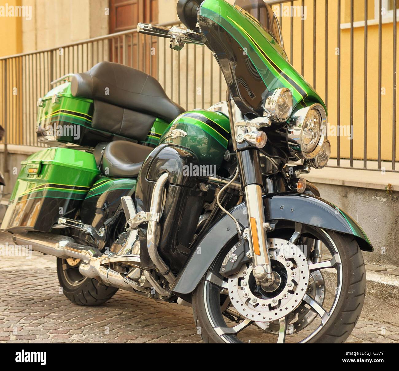 old retro motorcycle traveling through city streets Stock Photo - Alamy