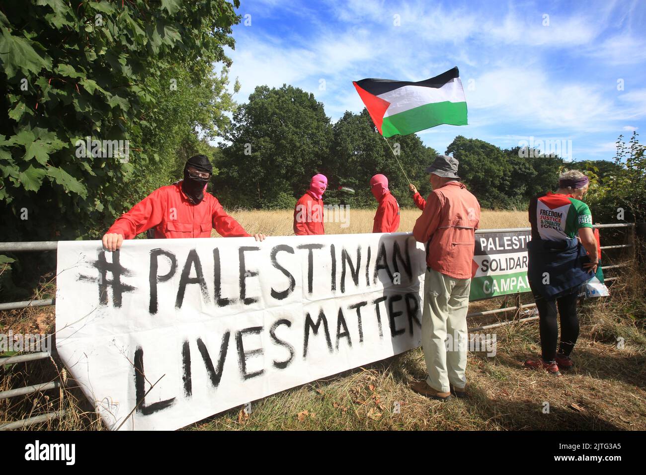 Shepstone, UK. 30th Aug, 2022. Palestinian flags and banners are ...