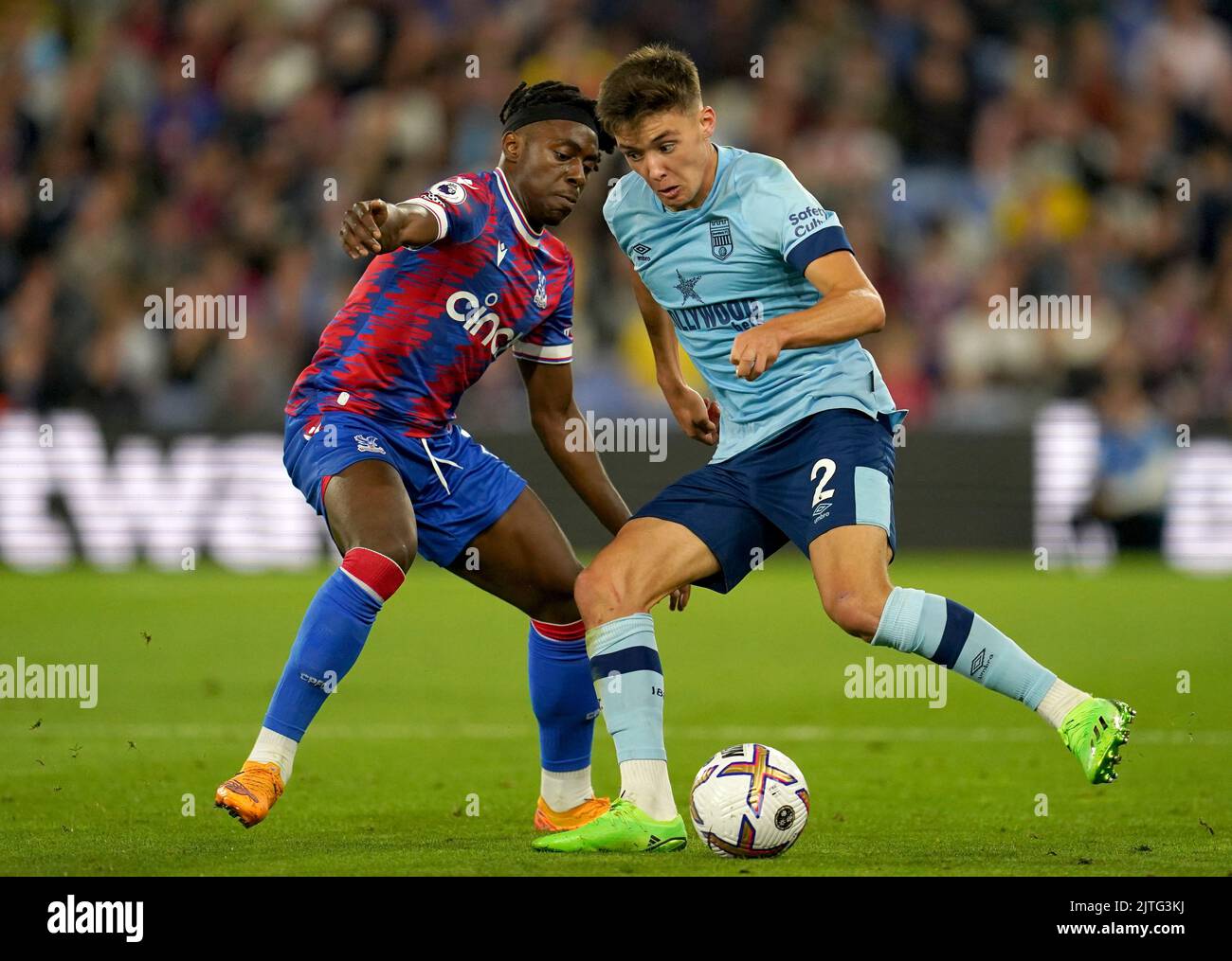 Crystal Palace's Eberechi Eze in action with Brentford's Aaron Hickey ...
