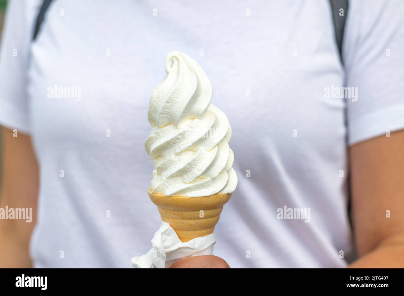 Soft vanilla ice cream with chocolate stick Stock Photo - Alamy
