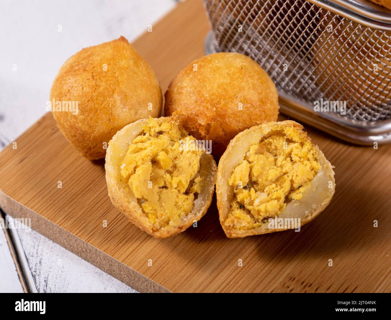 Brazilian snacks, fried balls stuffed with chicken Stock Photo - Alamy