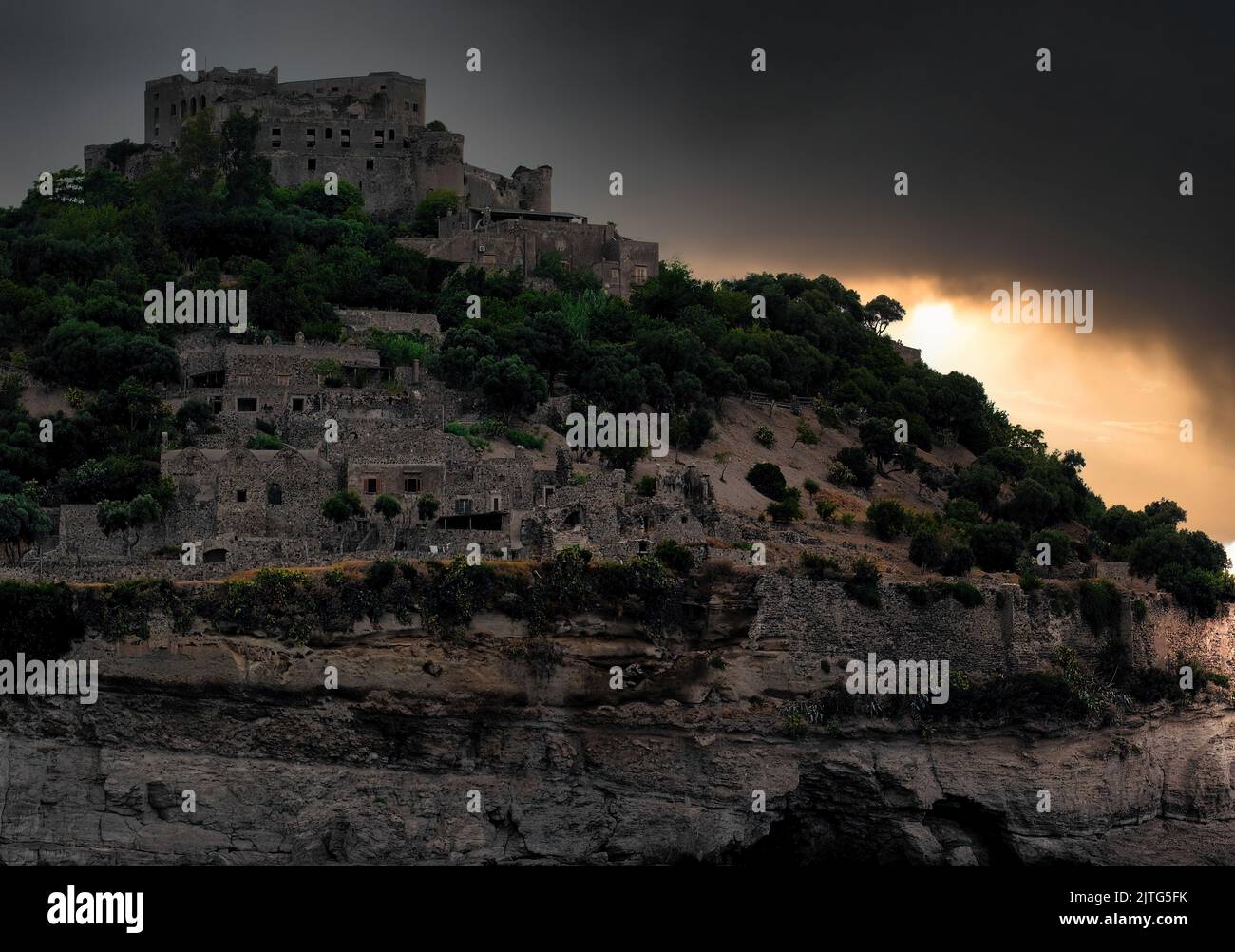 Beautiful sunset over the Aragonese castle in Ischia Ponte (Ischia Island, Naples, Italy) one of ...