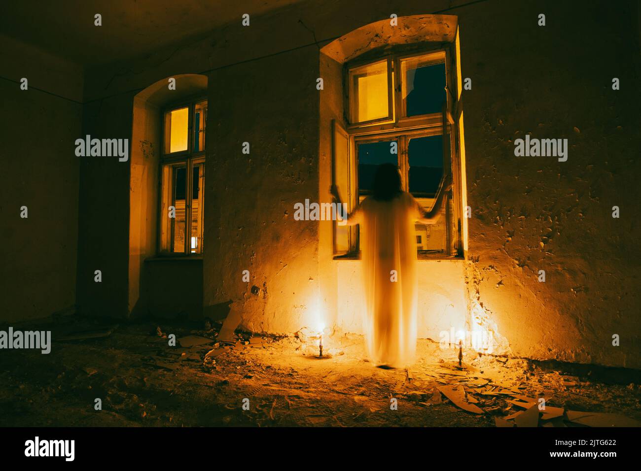 Ghost in abandoned, haunted house at night. Horror scene of scary ...