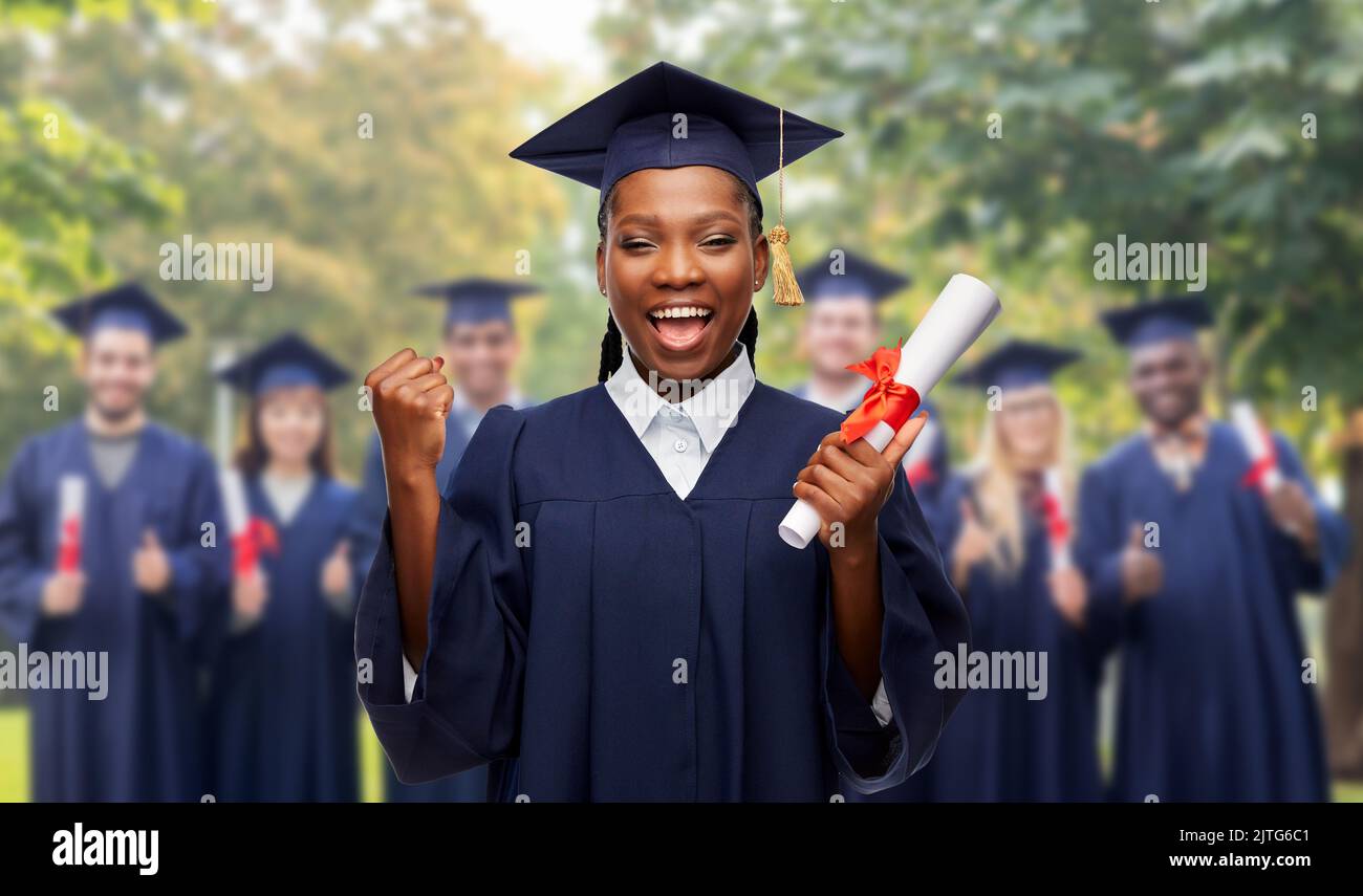 happy female graduate student with diploma Stock Photo - Alamy
