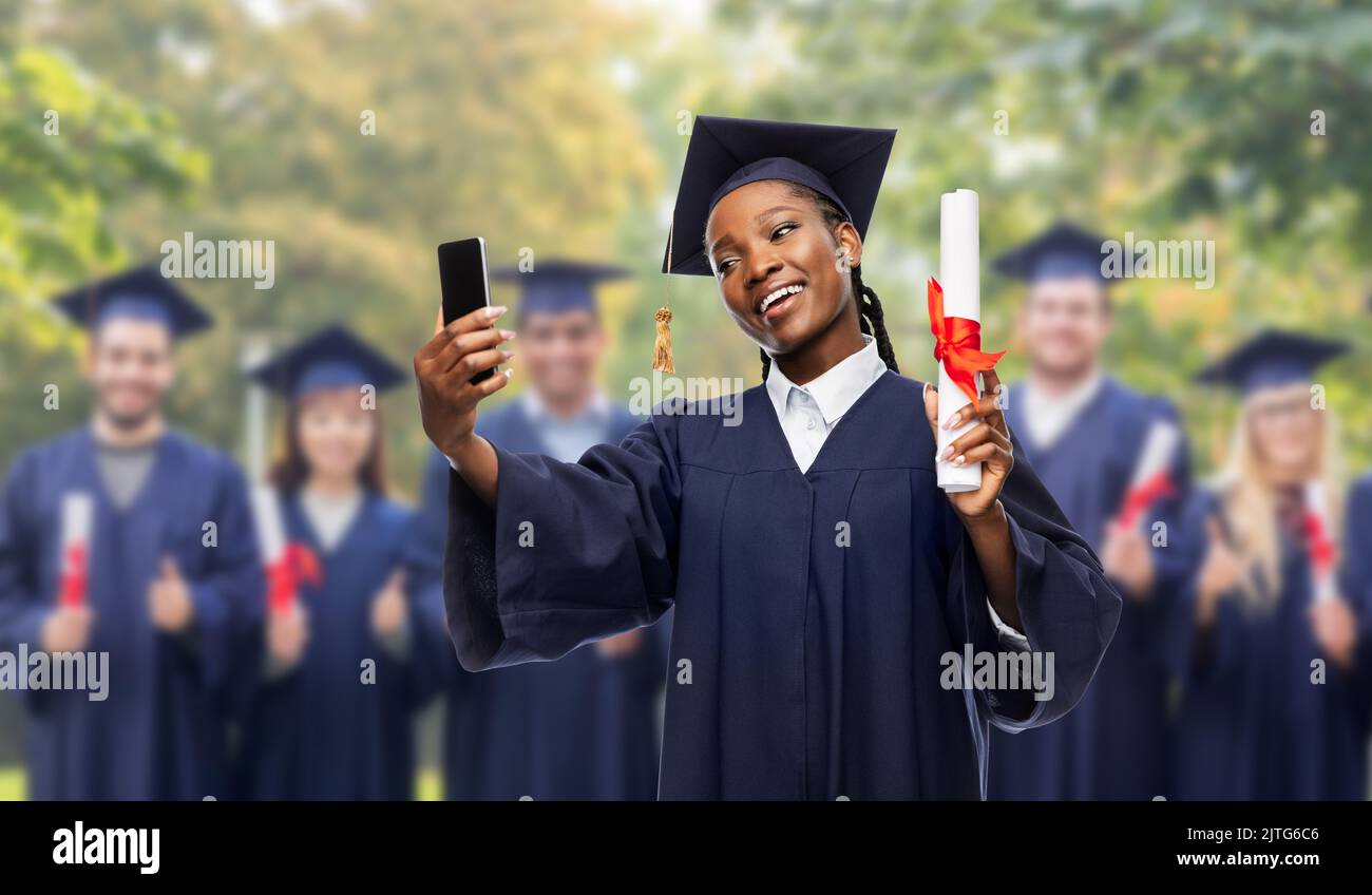 happy female graduate student with diploma Stock Photo - Alamy