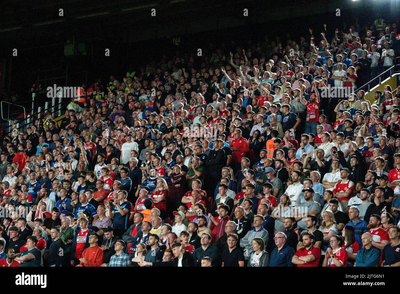 Middlesbrough fans in good voice Stock Photo - Alamy