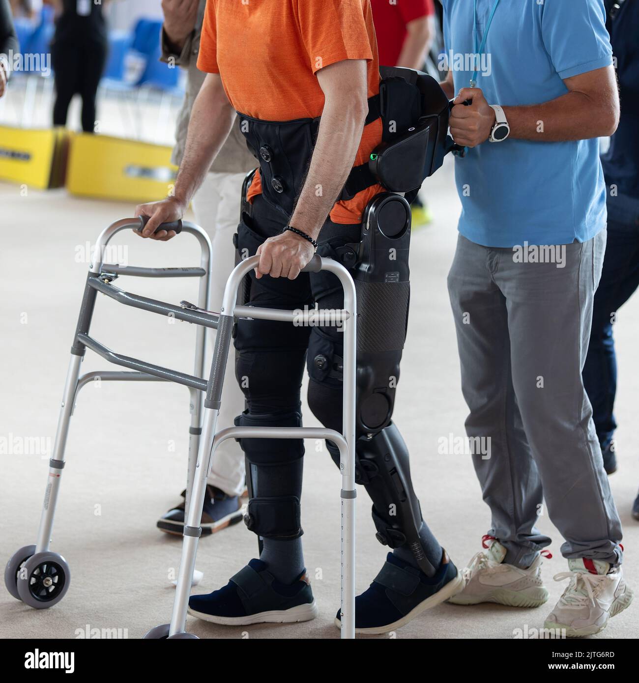 Boy with Mobility Problems in Lower Limbs in Upright Posture Walking ...