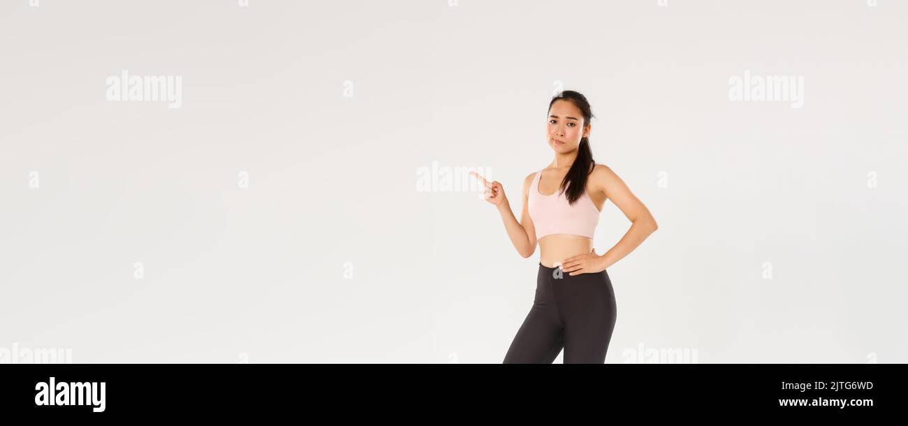 Sport, gym and endurance concept. Full length of skeptical and unamused ...