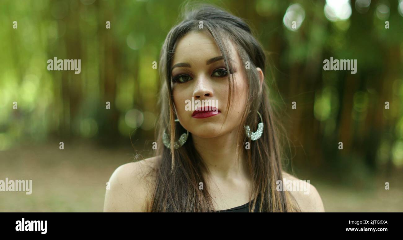 Serious defensive girl holding her hand in objection, saying NO. Young ...