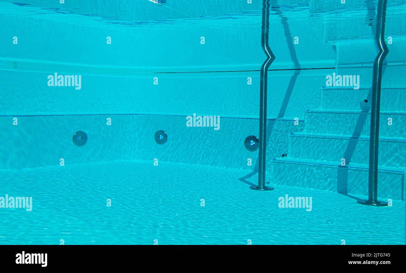 Underwater view of swimming pool with stairs Stock Photo - Alamy