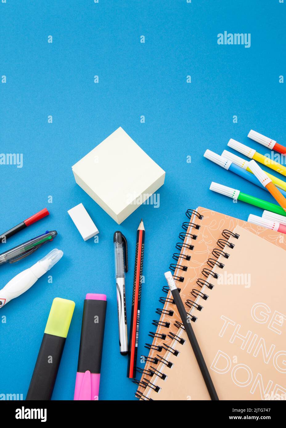 Pencils, eraser, pens, sticky note, markers, notebook and other office ...