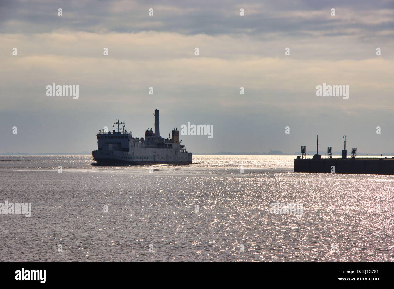 A cargo ship in the seaport of Emden, Germany Stock Photo - Alamy