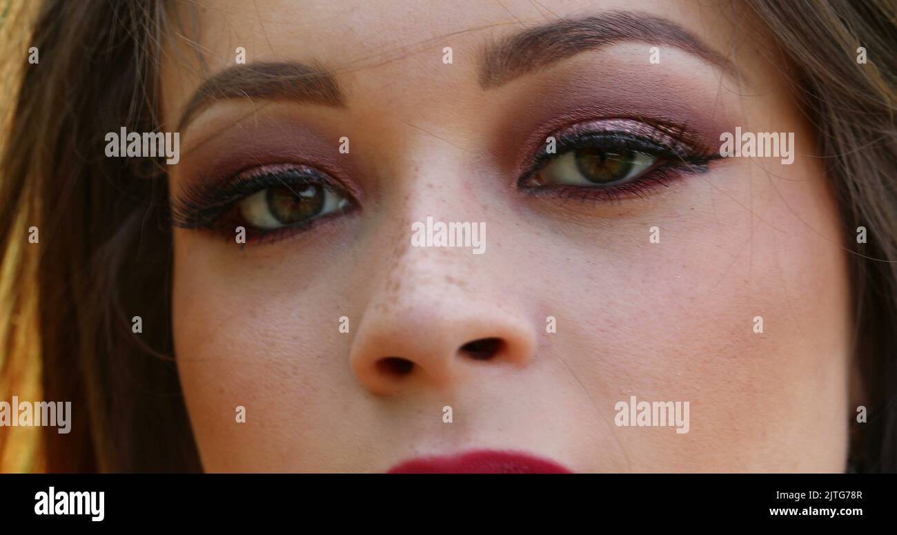 Woman macro closeup face opening eyes. Pretty millennial girl face ...