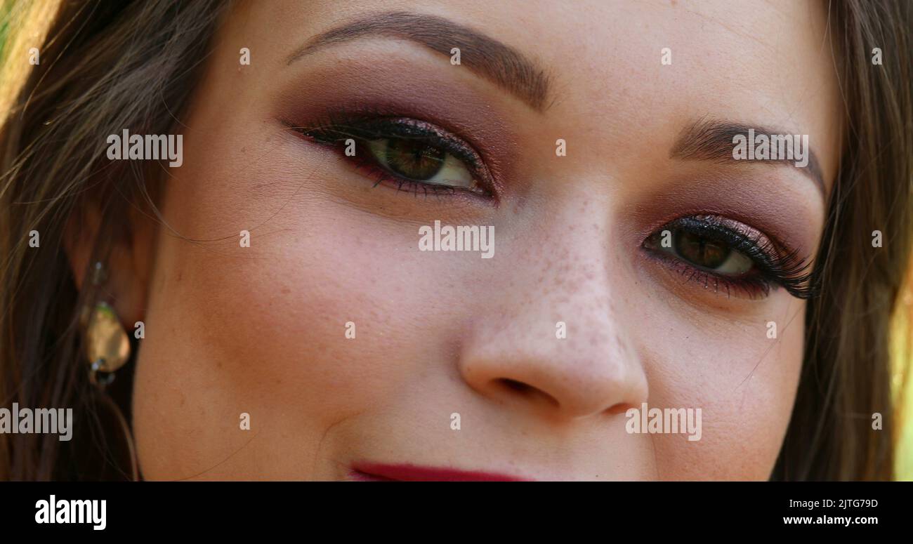 Woman macro closeup face opening eyes. Pretty millennial girl face ...