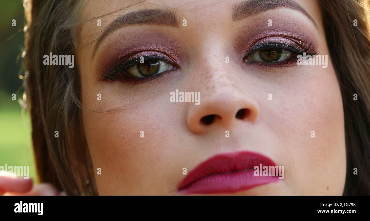 Woman macro closeup face opening eyes. Pretty millennial girl face ...