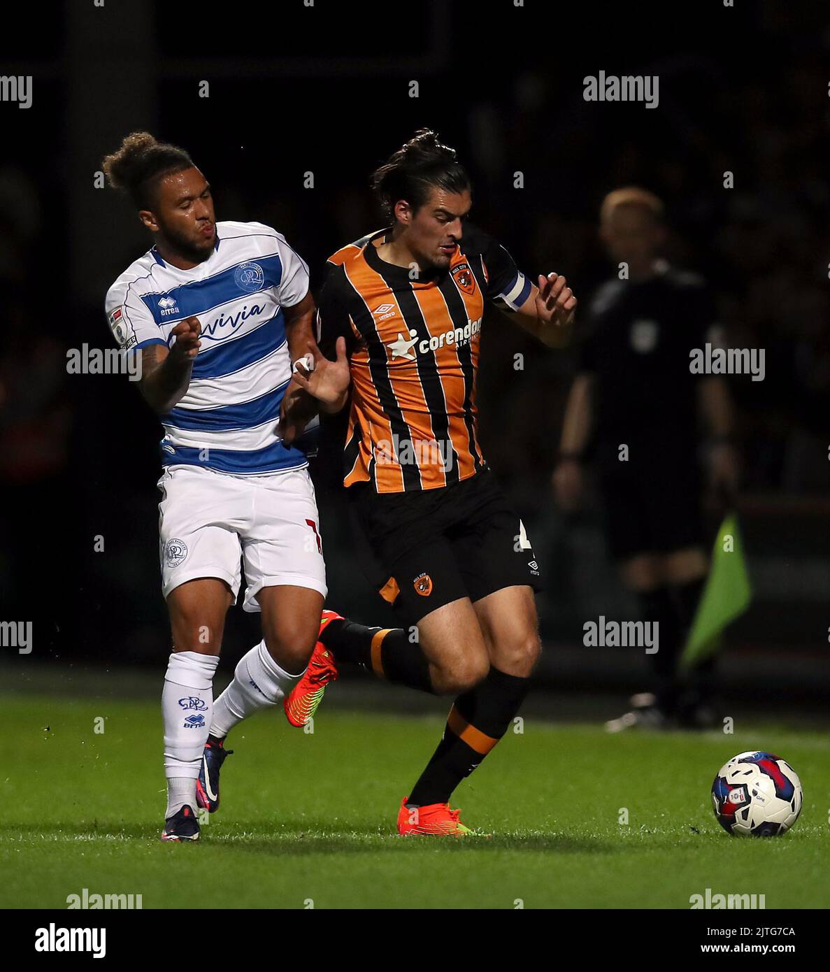 Queens Park Rangers's Tyler Roberts (left) and Hull City's Jacob ...