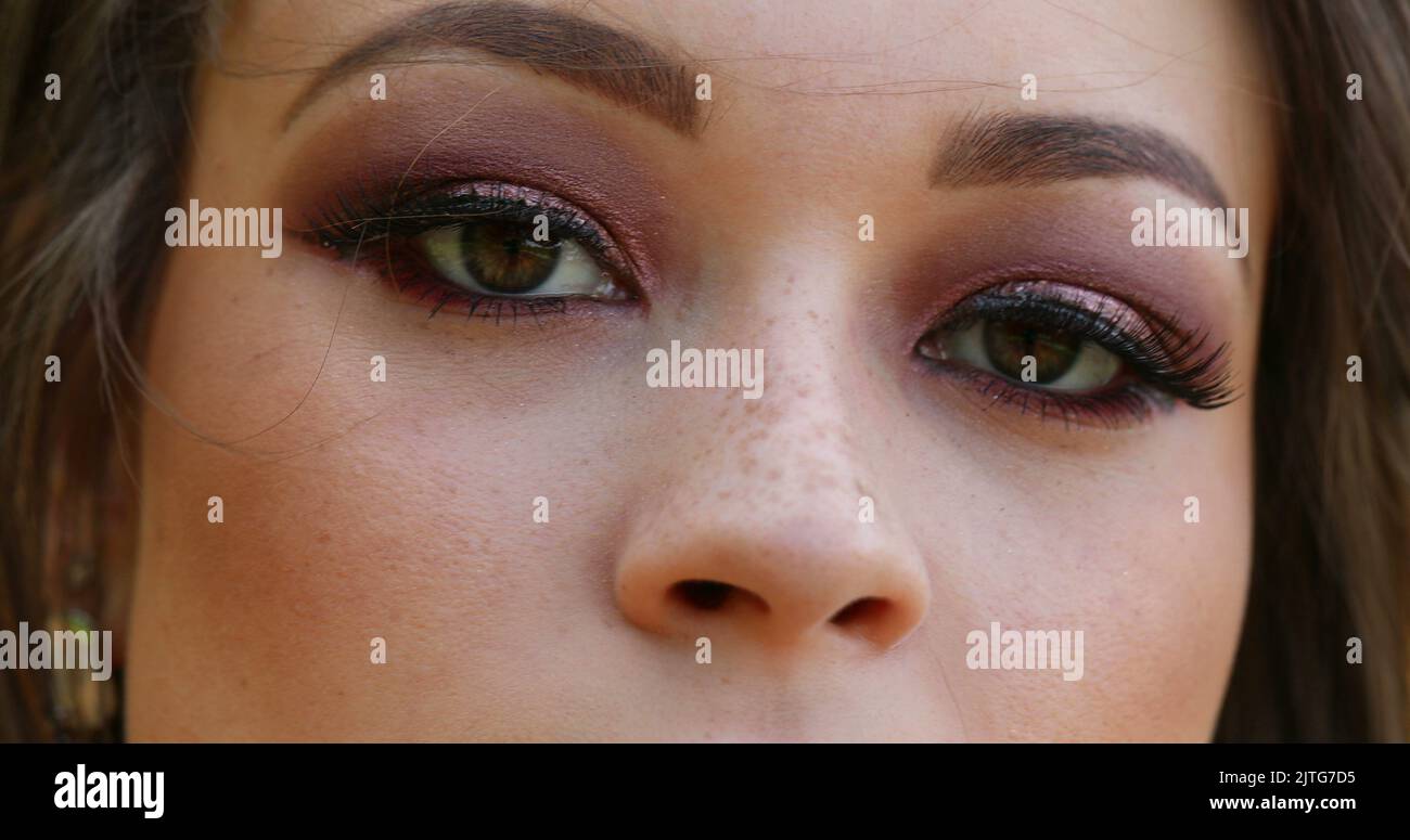 Woman macro closeup face opening eyes. Pretty millennial girl face ...