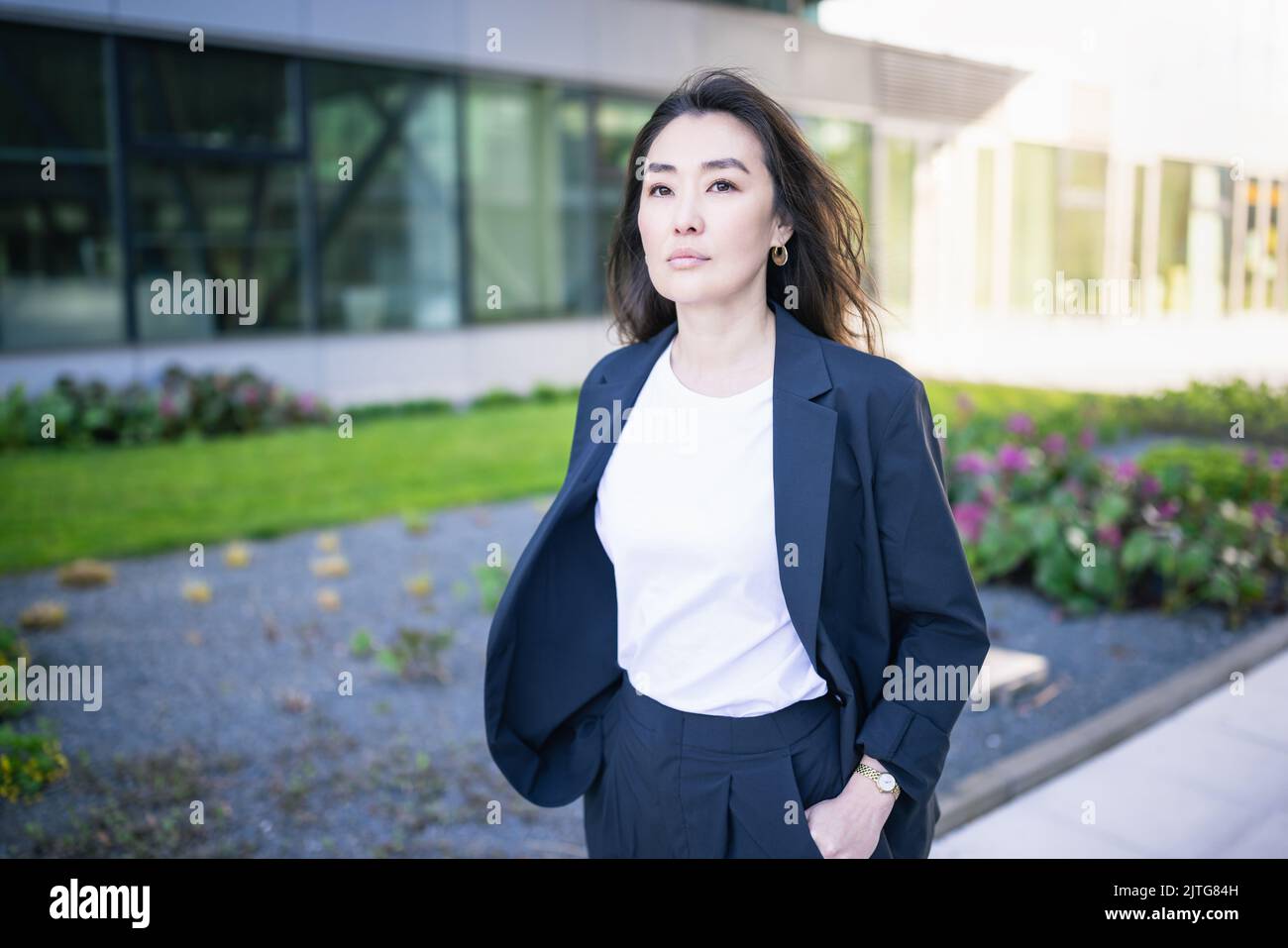 Asian confident business woman in suit. Bright future of career ...