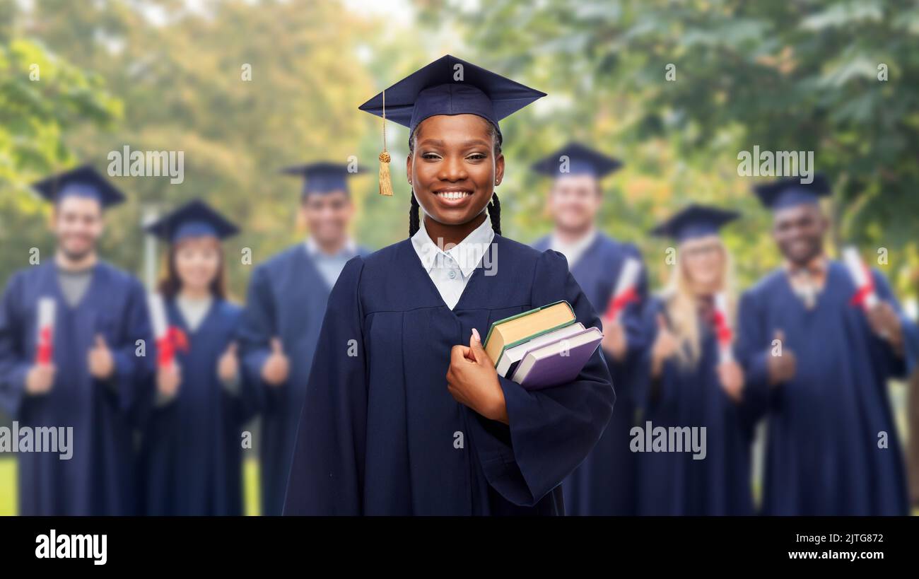 University student graduation books hi-res stock photography and images ...