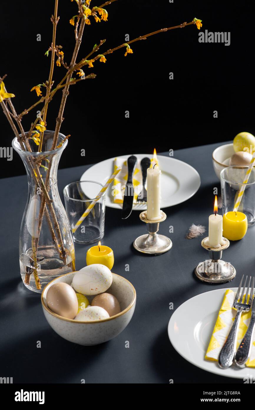 close up of easter table serving over black Stock Photo - Alamy